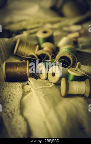 Old sewing threads, objects for sewing clothes Stock Photo - Alamy