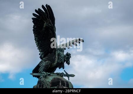 Old Metal Vulture Statue in Park with Light leak Stock Photo - Alamy