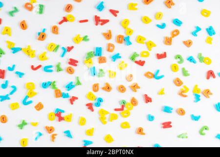 the colorful letters scattered on a white surface Stock Photo - Alamy