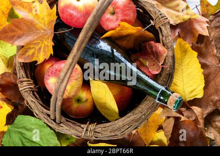 organic fresh apples with bottle of Normandy cider Stock Photo - Alamy