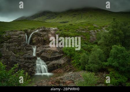 The meeting of the Three Waters waterfall in Glencoe, Highlands of ...