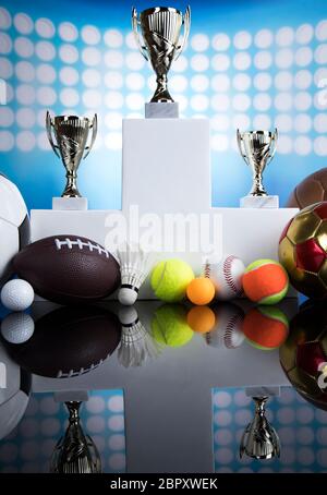 Podium for sports awards, equipment and balls Stock Photo - Alamy