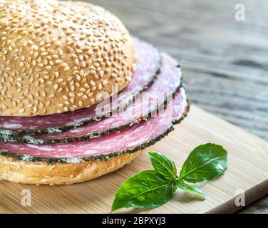 Sesame seed bun with homemade salami. Traditional german sandwich Stock ...