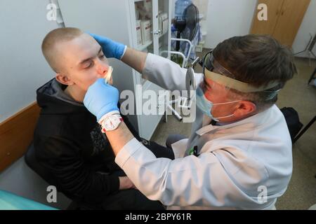 An army conscript undergoes medical examination at the Moscow regional ...
