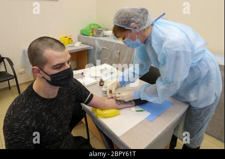 An army conscript undergoes medical examination at the Moscow regional ...