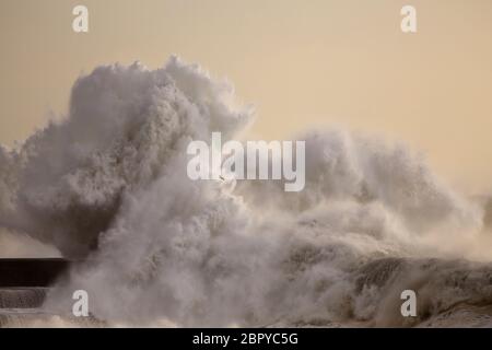 Huge wave splash over pier, Porto, Portugal Stock Photo - Alamy