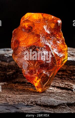A piece of yellow semi opaque natural amber, classification color ...