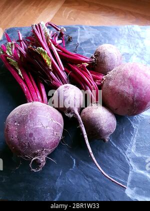 Freshly picked beetroot on a slate background Stock Photo - Alamy
