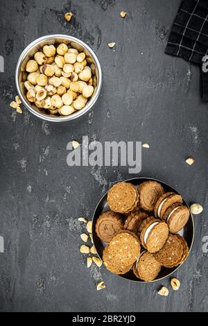 A selective focus shot of crispy cookies on a wooden board Stock Photo ...