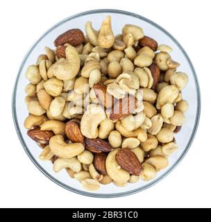 Fresh roasted nuts isolated on white background as close up shot ...