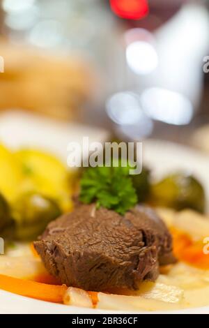 tafelspitz on a plate with vegetables Stock Photo - Alamy
