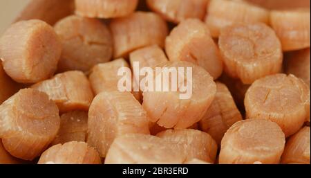 Raw scallops heap in the bowl ready for cooking Stock Photo - Alamy
