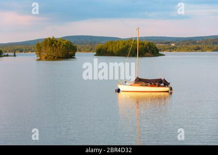Yacht on the Pogoria IV lake at sunset, Dabrowa Gornicza, Poland Stock ...