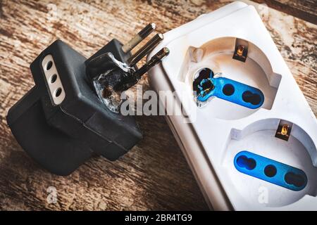 Power strip electrocution burnt danger vintage background Stock Photo ...