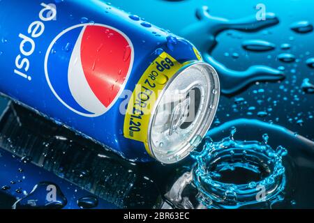 Black and Blue Pepsi can on dark background. Pepsi is a carbonated soft ...
