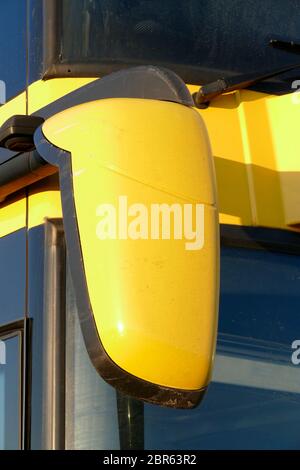 Yellow rearview mirror on a coach Stock Photo - Alamy