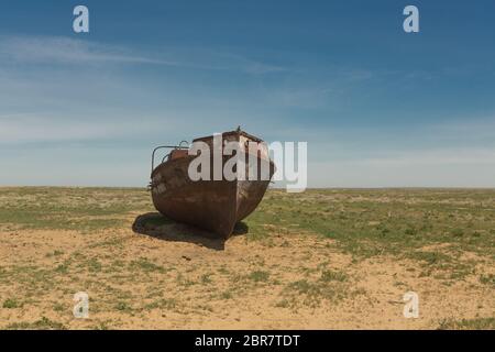 Old boat on dry land Stock Photo - Alamy