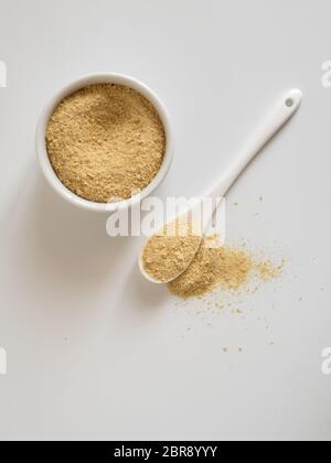 Nutritional inactive yeast top view Stock Photo - Alamy