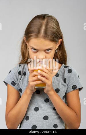 Portrait of a ten-year-old schoolgirl with a book Stock Photo - Alamy