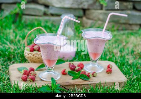 Strawberrie smoothie outside summer, basket with strawberries Stock ...