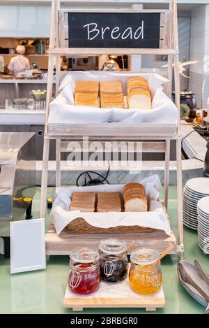 variety of bakery bread and rolls station in buffet line Stock Photo ...