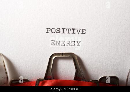 Positive energy text written with a typewriter Stock Photo - Alamy