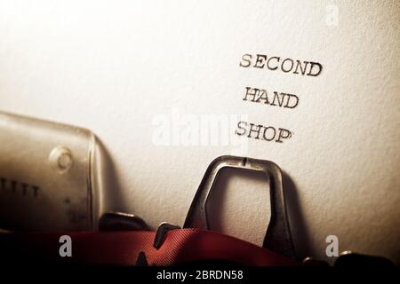 Second hand shop written with a typewriter Stock Photo - Alamy