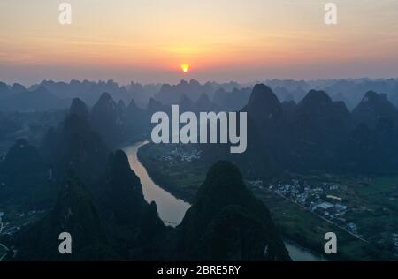Guilin. 19th May, 2020. Aerial photo taken on May 19, 2020 shows the scenery at Xingping Town in ...
