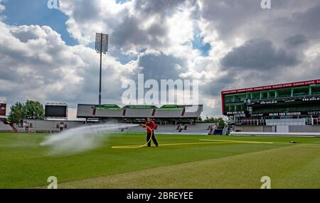 Groundsman David Shortt works on the pitch at Emirates Old Trafford ...