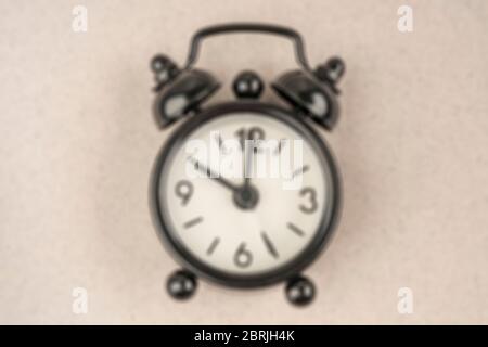 Analog alarm clock showing ten o'clock, 10pm or 10 am isolated on white ...