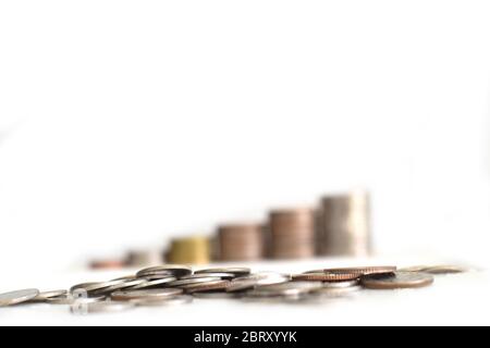 Columns of gold coins, piles of coins on working table, business ...