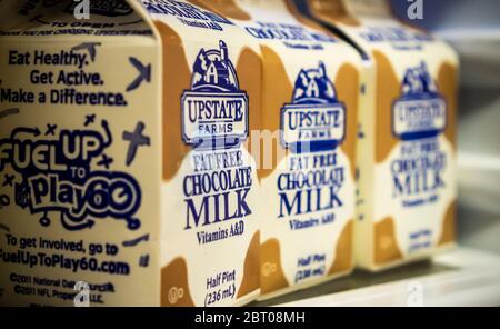 Containers of Upstate Farms brand fat free chocolate milk in a ...
