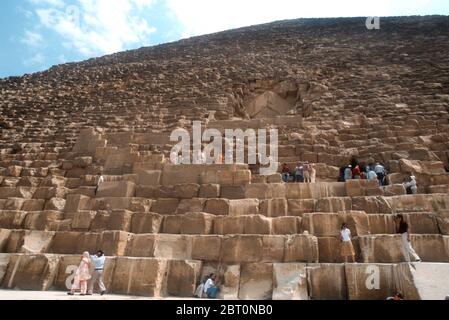 People climbing the Great Pyramid, Egypt Stock Photo - Alamy