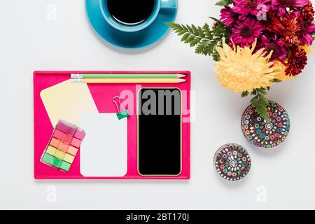 Colorful office cellphone layout with desk accessories Stock Photo - Alamy