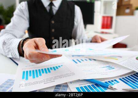 Male accountant setting things in order Stock Photo - Alamy