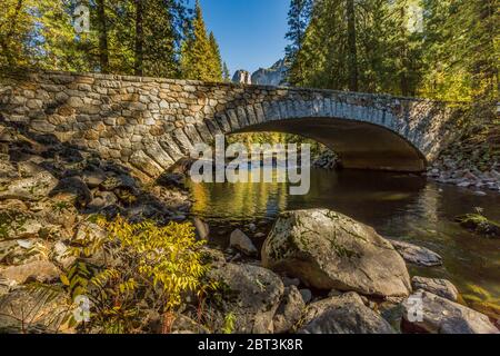 Pohono Bridge over the Merced River in autumn in Yosemite Valley ...