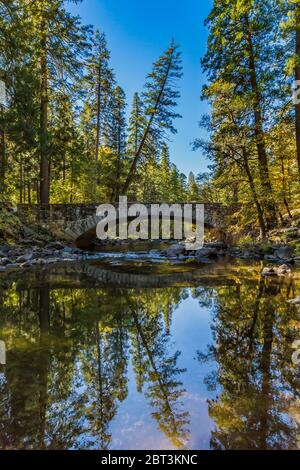 Pohono Bridge over the Merced River in autumn in Yosemite Valley ...