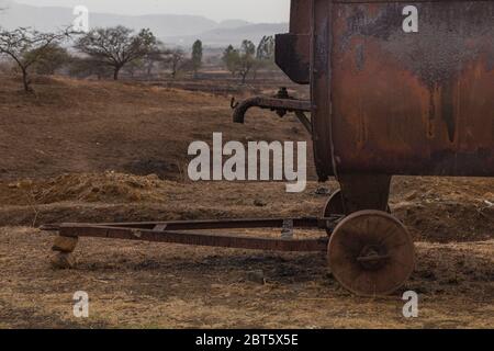a mobile tar melting furnace with a tank above to melt the tar or ...