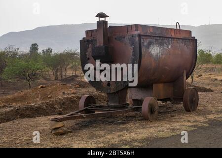 a mobile tar melting furnace with a tank above to melt the tar or ...