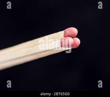 Match head close-up on a white background Stock Photo - Alamy