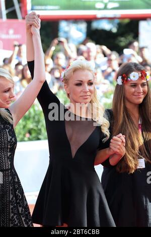 VENICE, ITALY - SEPTEMBER 05: Kitty Green, Femen activists Inna Shevchenko, Sasha Shevchenko and ...