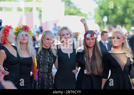 VENICE, ITALY - SEPTEMBER 05: Kitty Green, Femen activists Inna Shevchenko, Sasha Shevchenko and ...