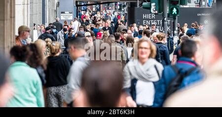 Hamburg, Germany. 23rd May, 2020. People walk densely packed over ...