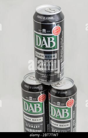 Three green cans of beer. Background for a pub. Beer store. Relax at ...