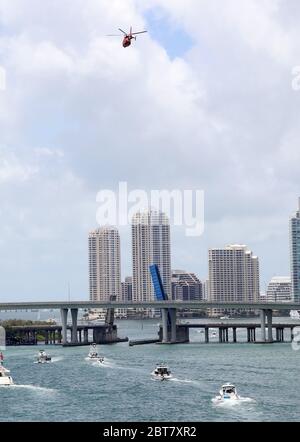 MIAMI, FL - MAY 8: A USCG MH65 Helicopter and USCG C-144 aircraft from ...