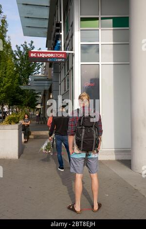 People practice social distancing during a news conference with ...
