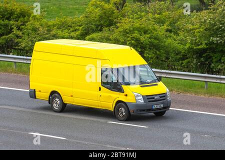 2010 yellow Ford Transit van Stock Photo - Alamy