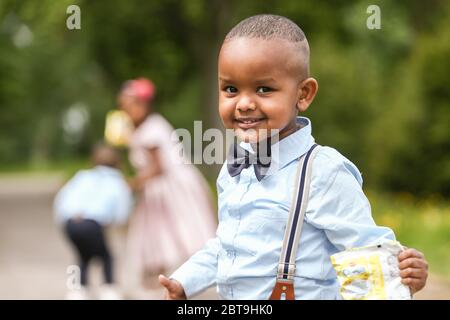Young British black children playing in the park, UK Stock Photo - Alamy