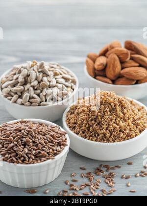 Homemade LSA mix in plate and Linseed or flax seeds, Sunflower seeds ...