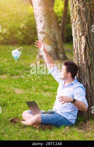 Throwing Medical Corona Virus Face Mask In Bin Stock Photo - Alamy